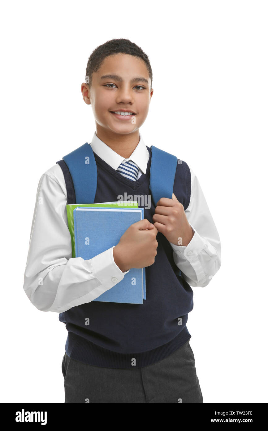 Cute boy with backpack on white background Stock Photo - Alamy