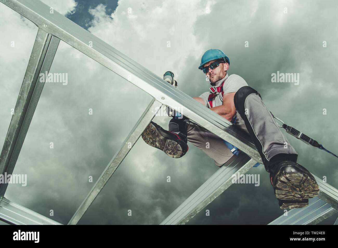 Contractor Worker at Height. Working on Skeleton Steel Frame of ...