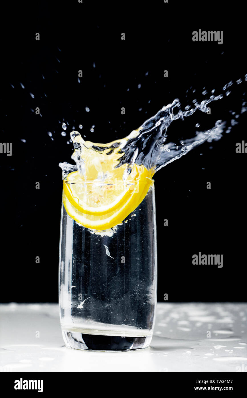 Splash clear lemonade Stock Photo - Alamy
