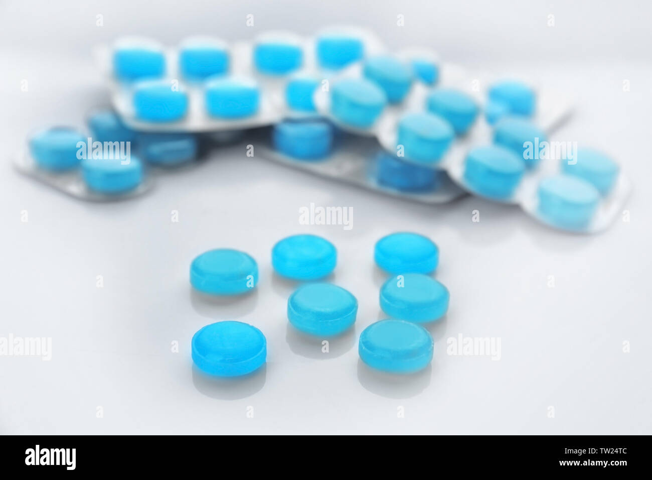 Cough drops on white background Stock Photo - Alamy