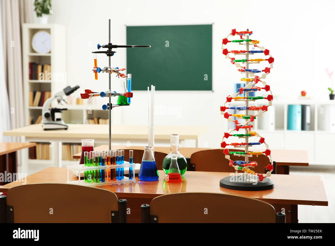 Desks with different tools in chemistry class Stock Photo - Alamy