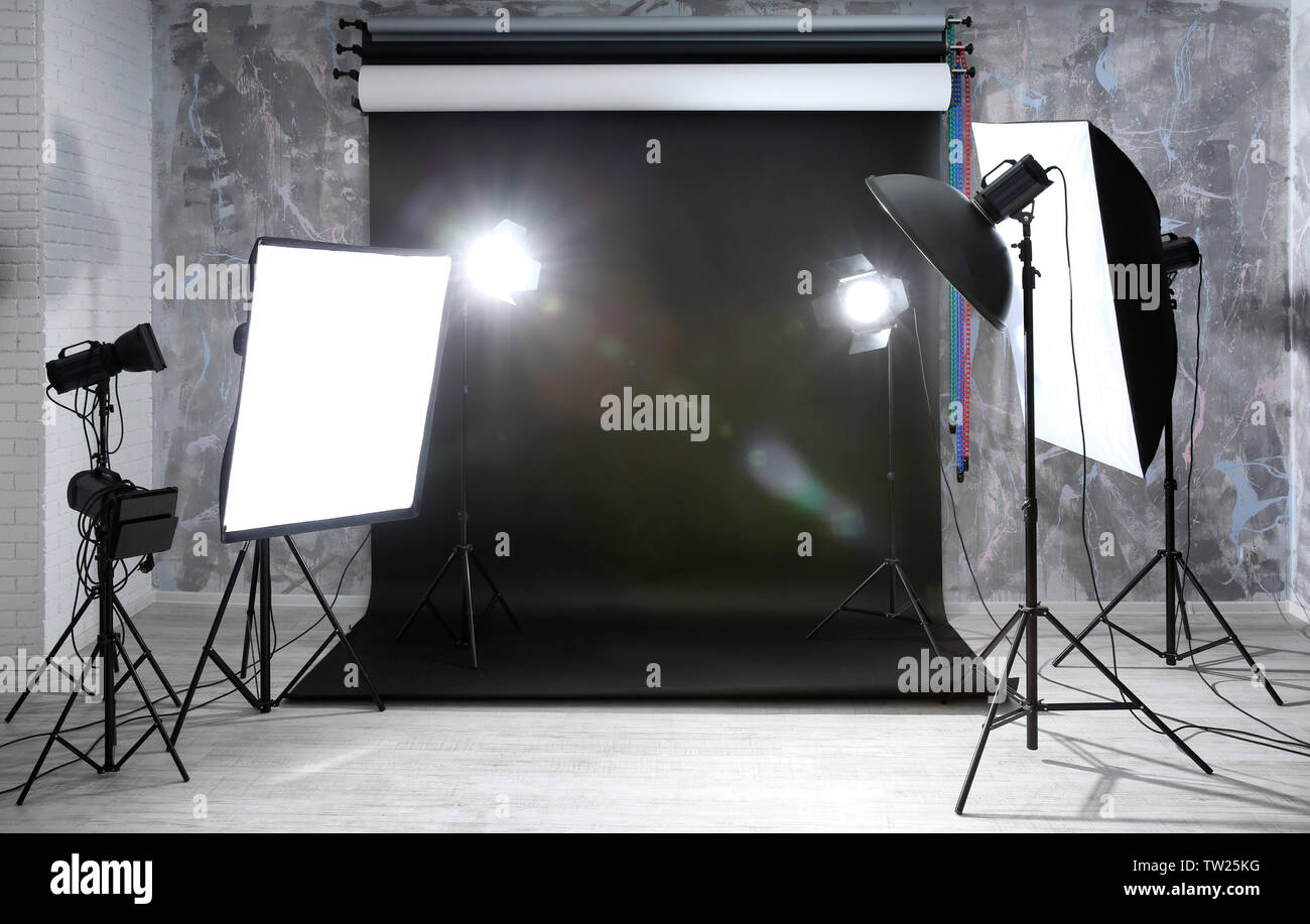 Modern photo studio interior with professional lighting equipment Stock ...