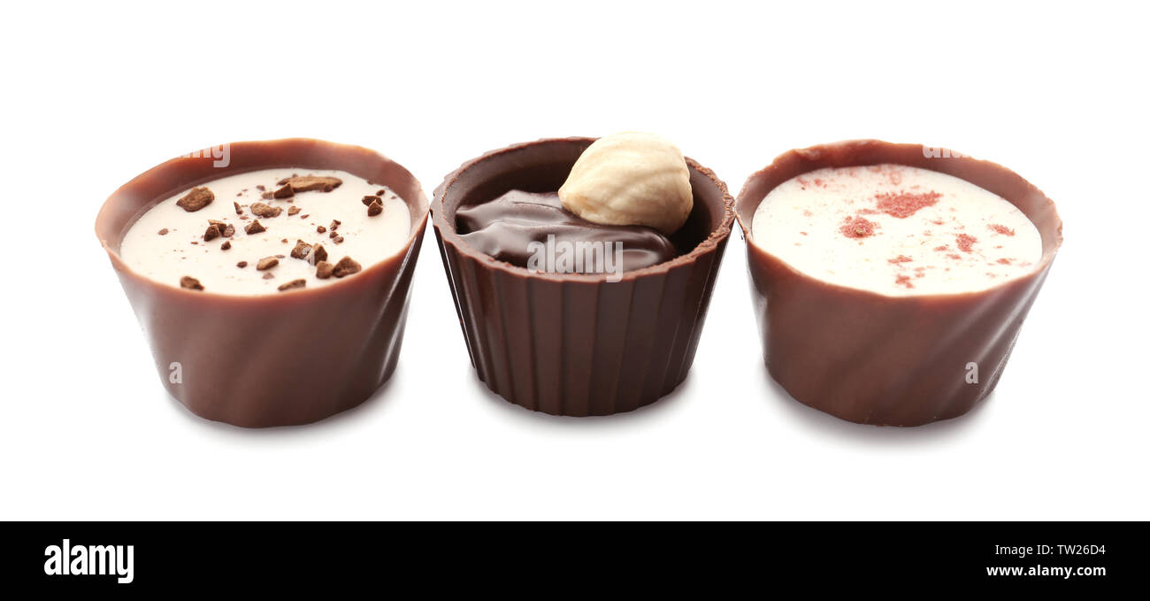 Delicious chocolate candies, isolated on white Stock Photo - Alamy