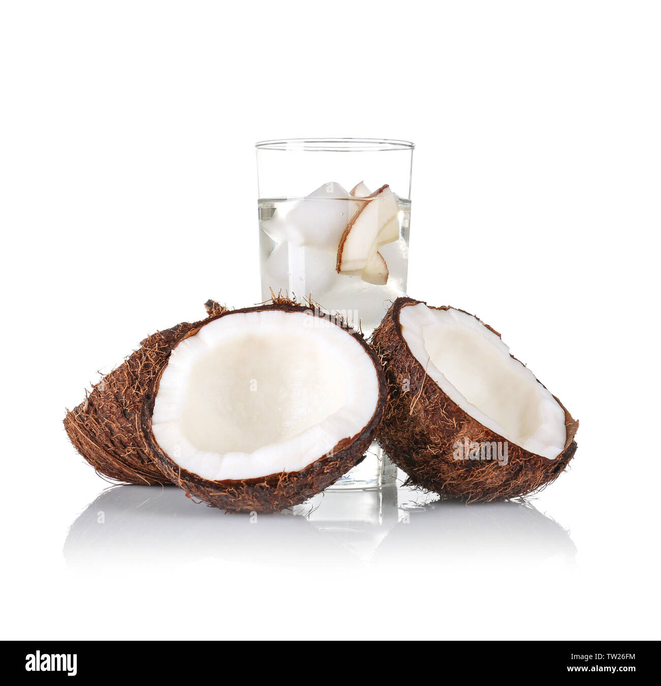 Glass of coconut water and fresh nut on white background Stock Photo ...
