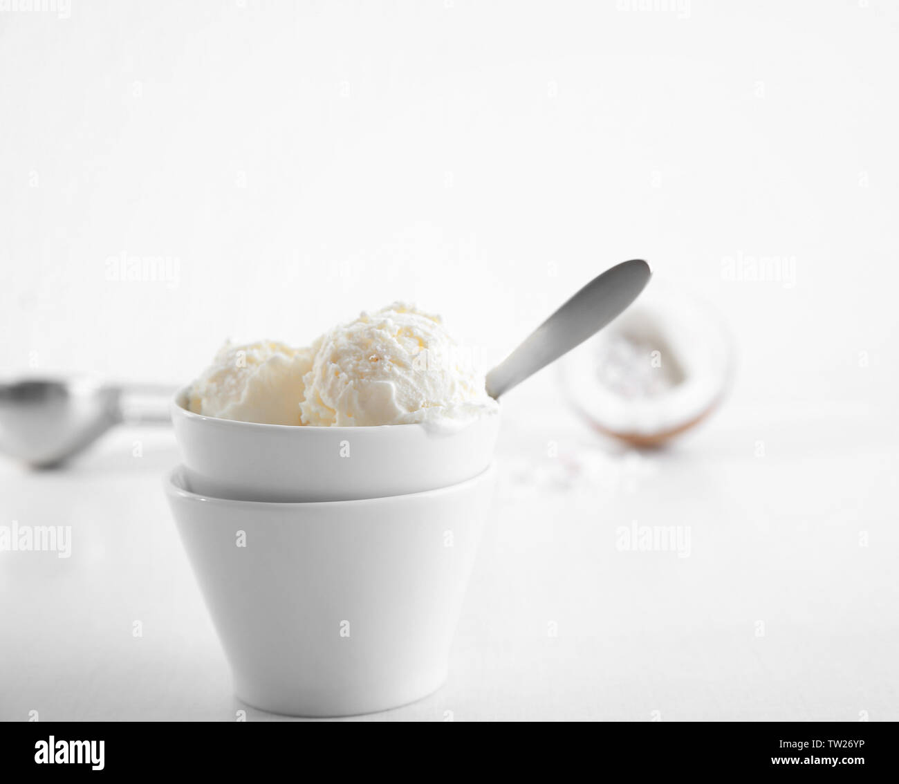 Fresh coconut ice cream on white background Stock Photo - Alamy