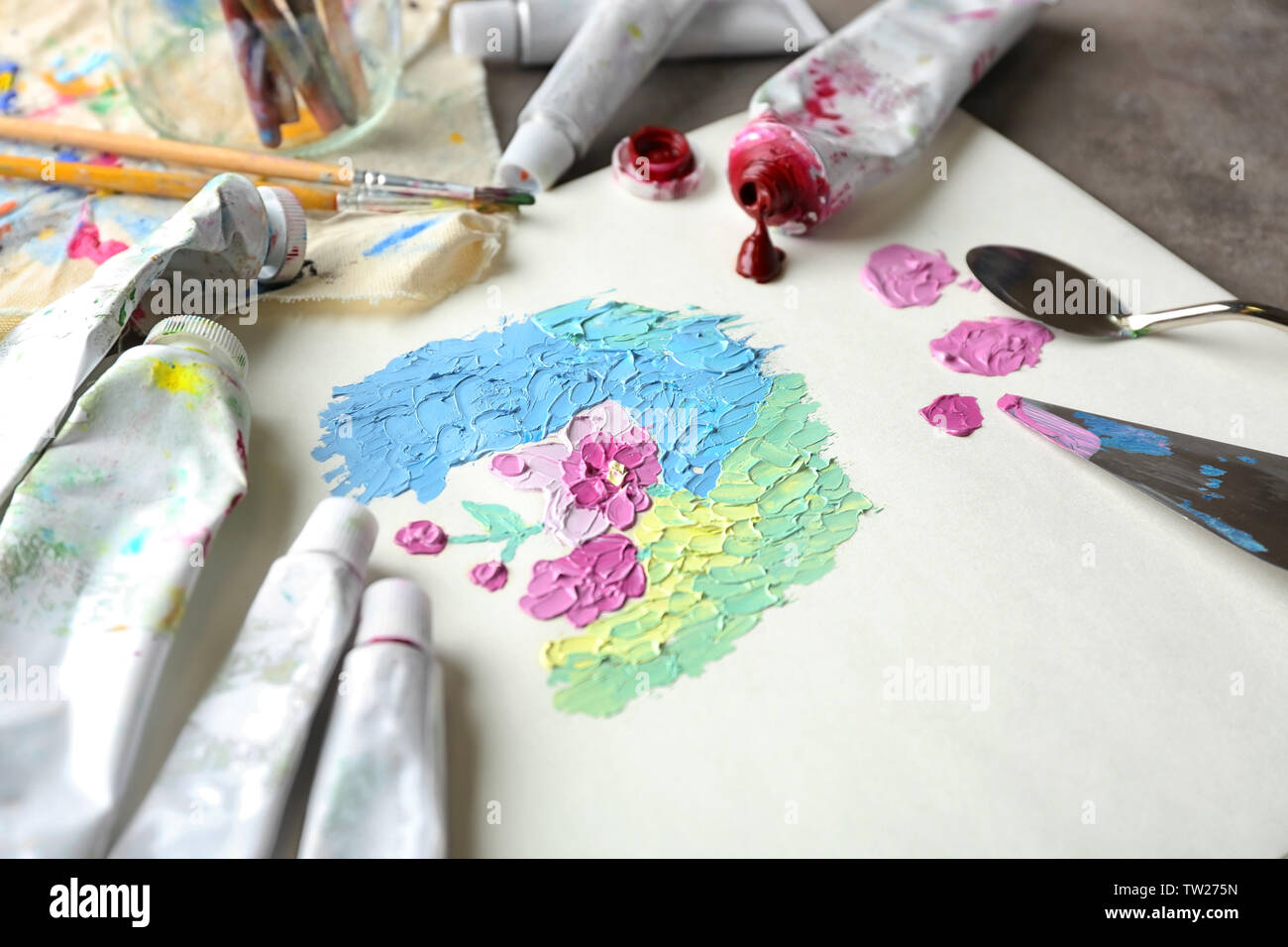 Beautiful picture made of oil paint strokes and craftsman's tools on ...