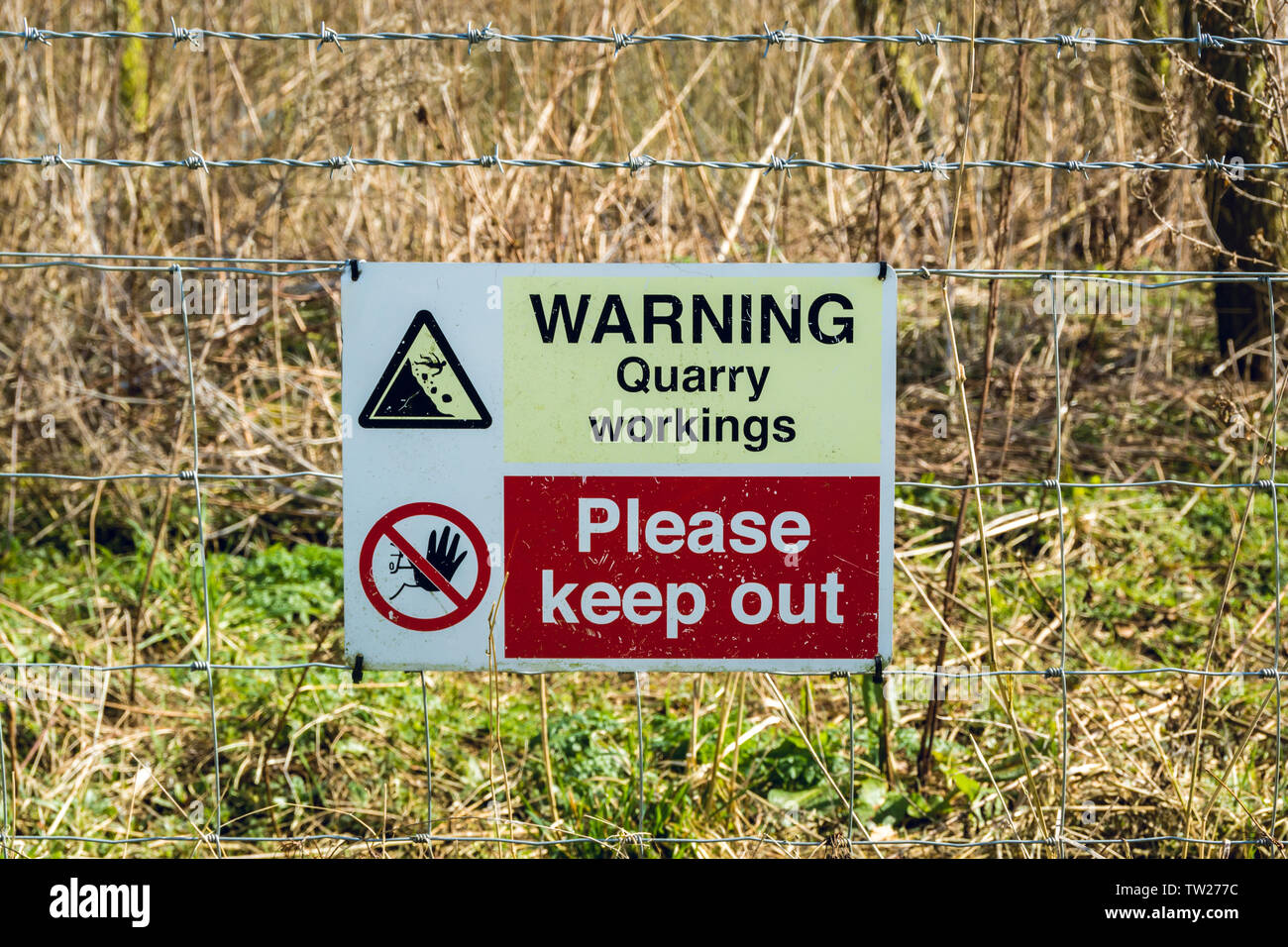 Warning sign of quarry workings Stock Photo - Alamy