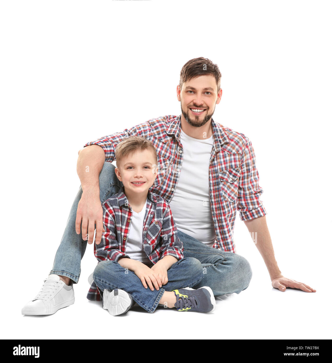 Handsome man with his son on white background Stock Photo - Alamy