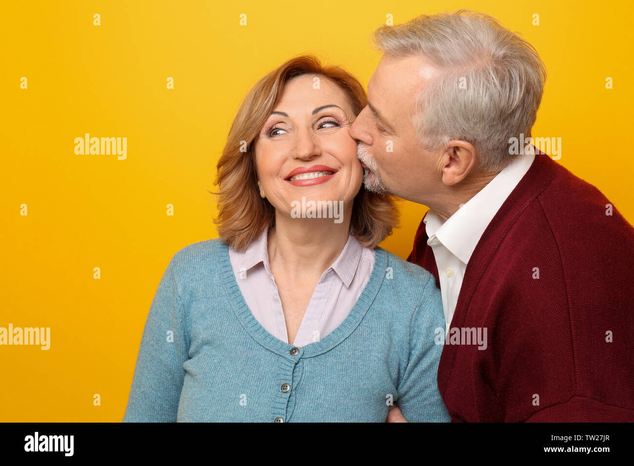 Sweet senior couple kissing on hi-res stock photography and images - Alamy