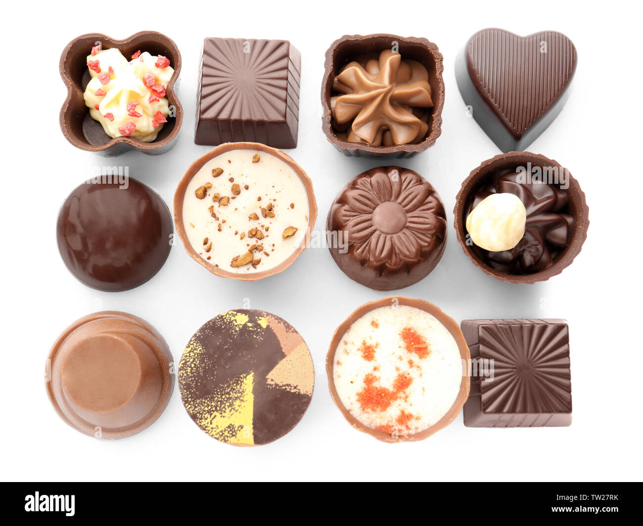 Delicious chocolate candies, isolated on white Stock Photo - Alamy