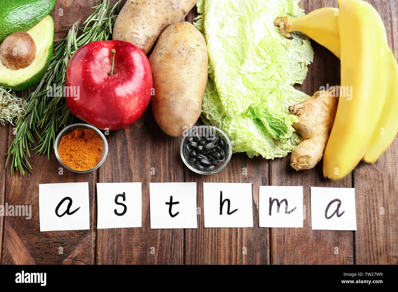 Text ASTHMA and set of healthy products on wooden background Stock ...