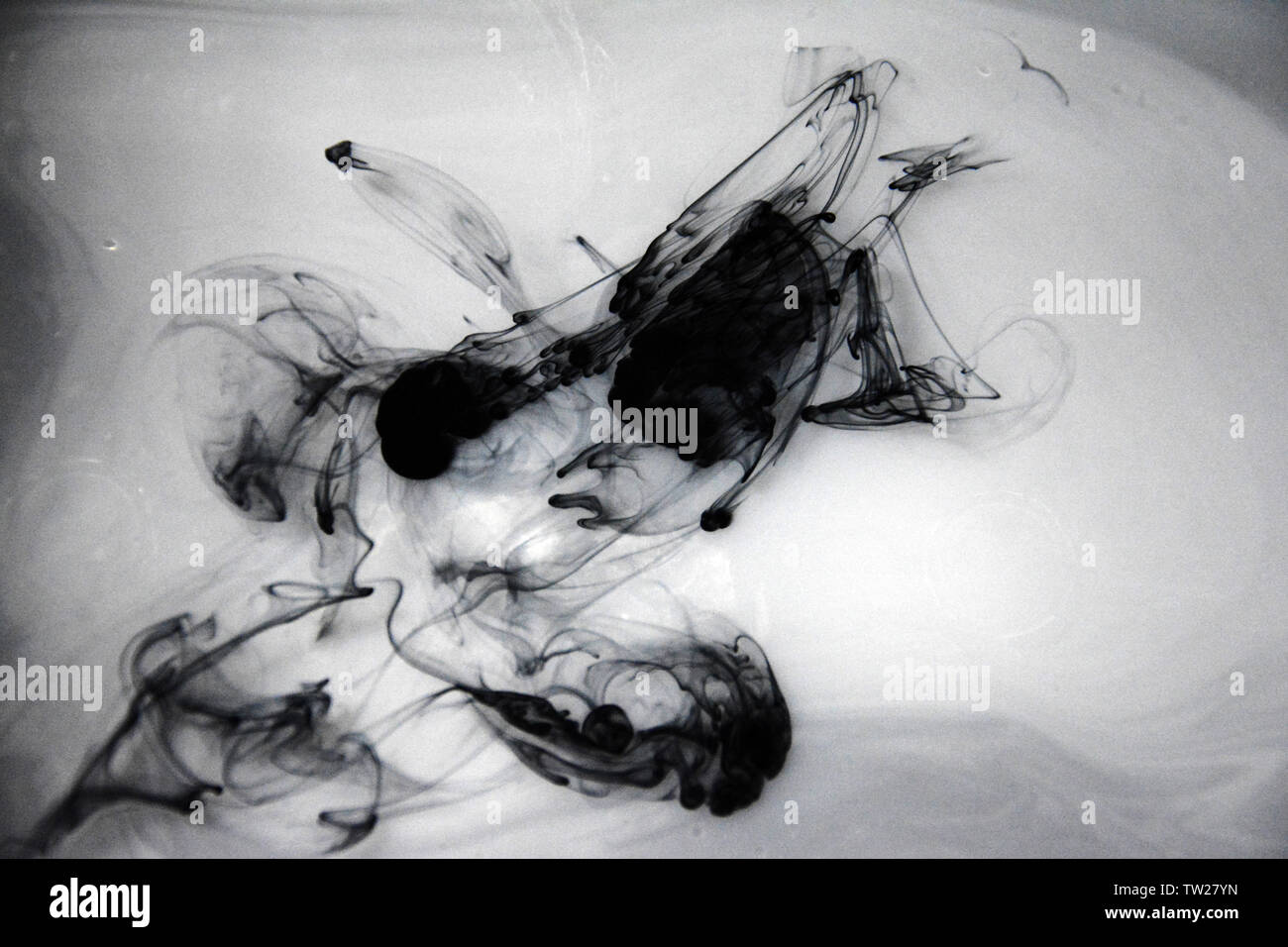 Ink background, ink flowing in water Stock Photo - Alamy