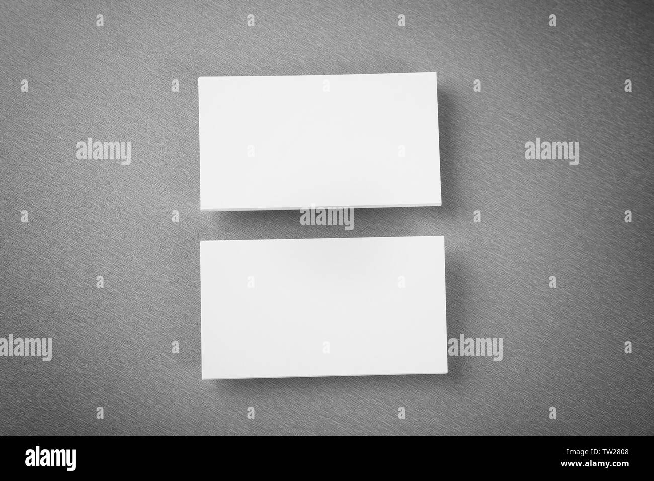 Blank paper cards for branding on grey background Stock Photo - Alamy
