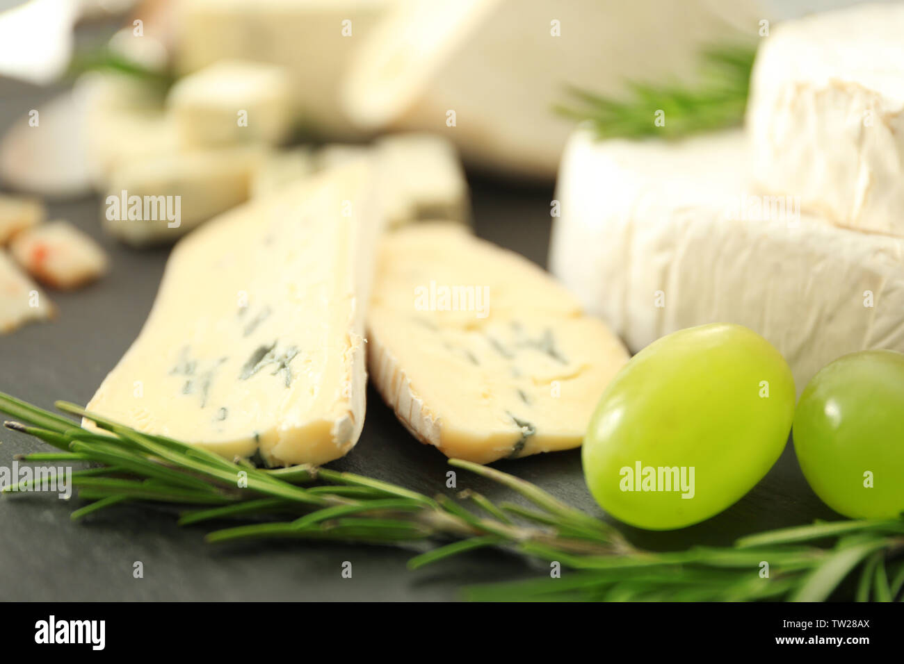 Delicious sliced blue cheese, closeup Stock Photo - Alamy