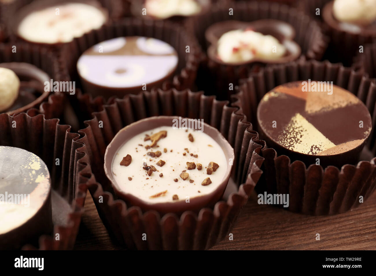 Delicious chocolate candies, closeup Stock Photo - Alamy