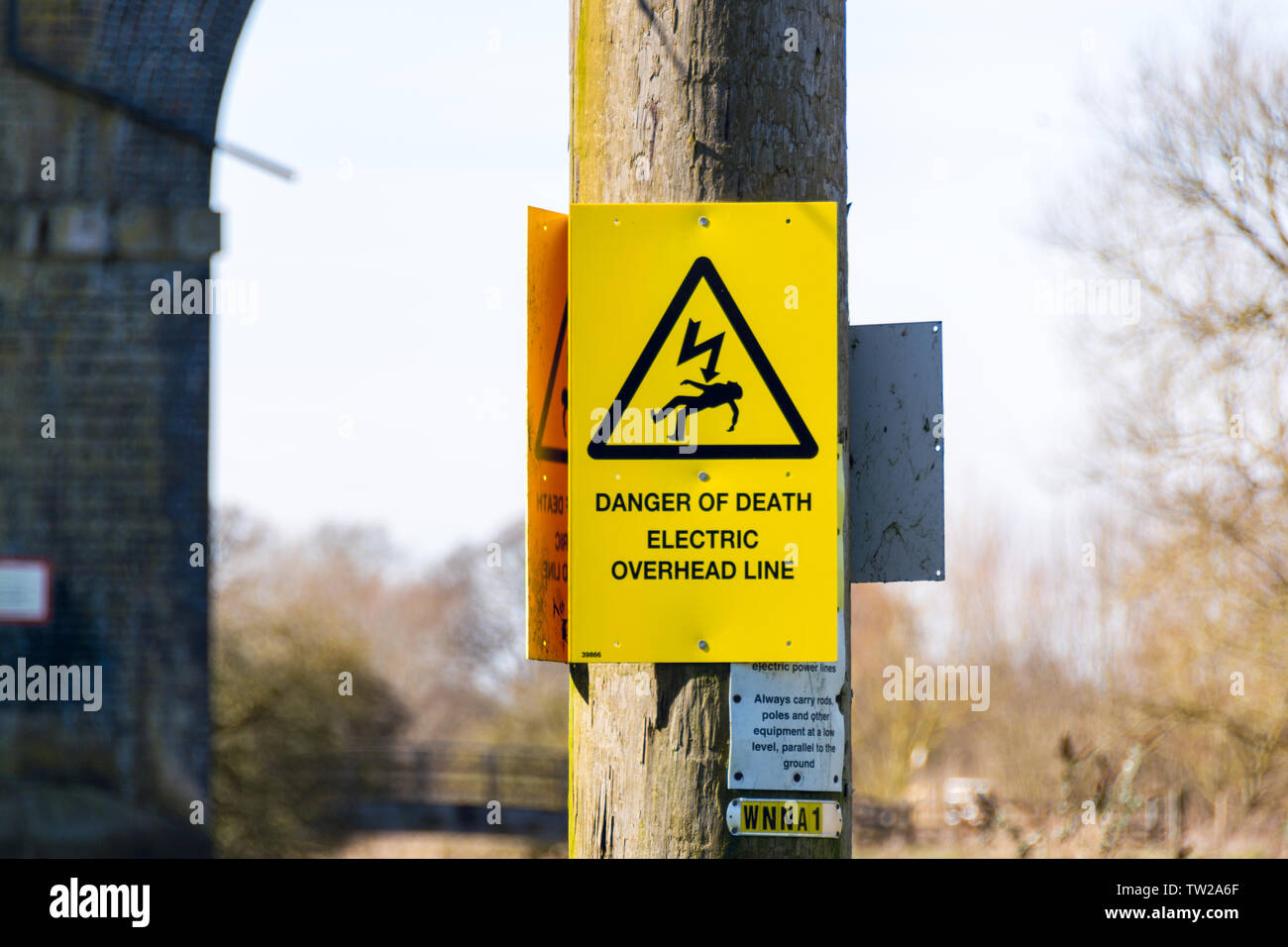 Warning sign on the pole of electric overhead power line - 1 Stock ...