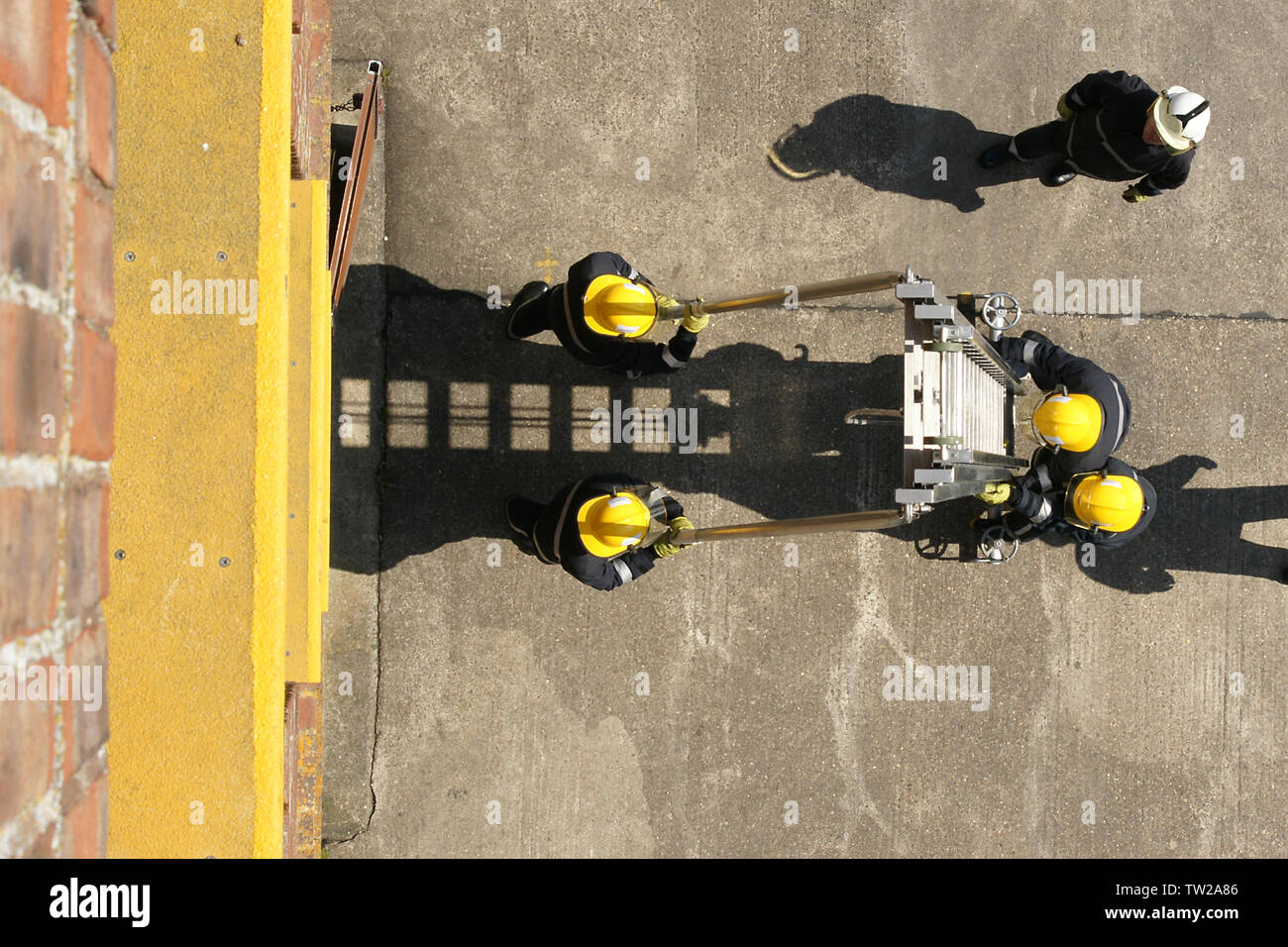Fireman and ladder hi-res stock photography and images - Alamy