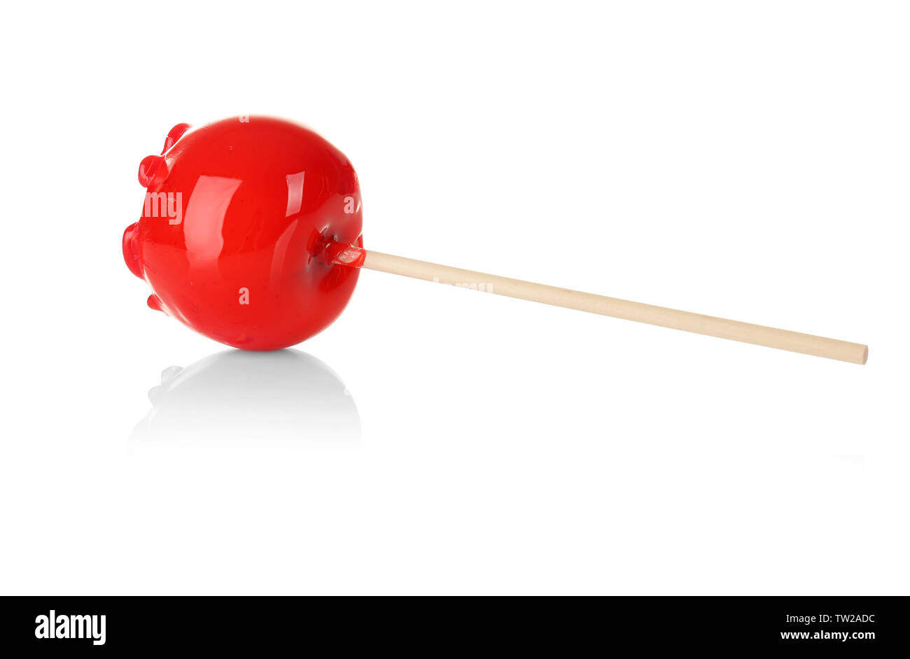 Candy apple on white background Stock Photo - Alamy