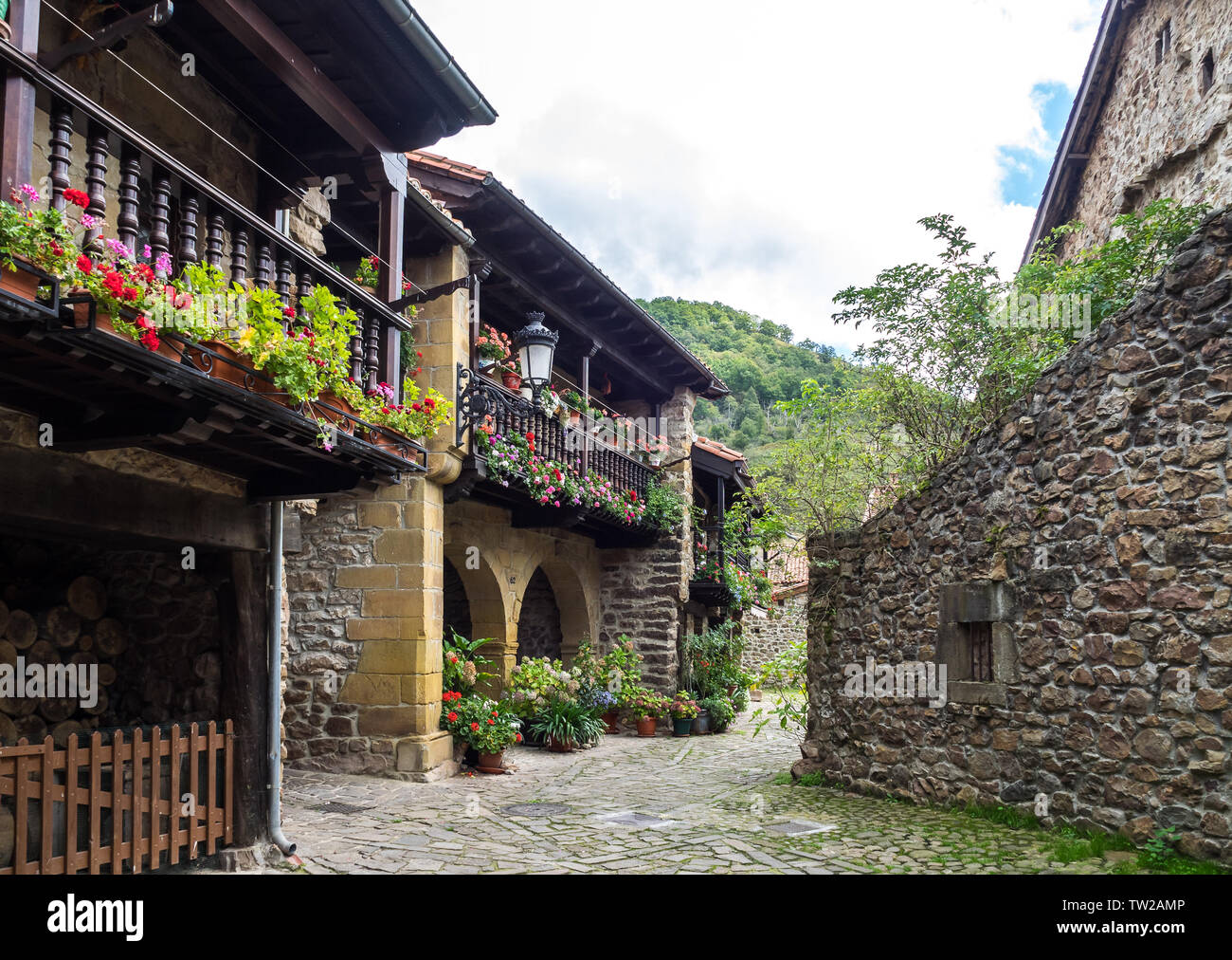 Barcena Mayor, Cabuerniga valley, with typical stone houses is one of ...