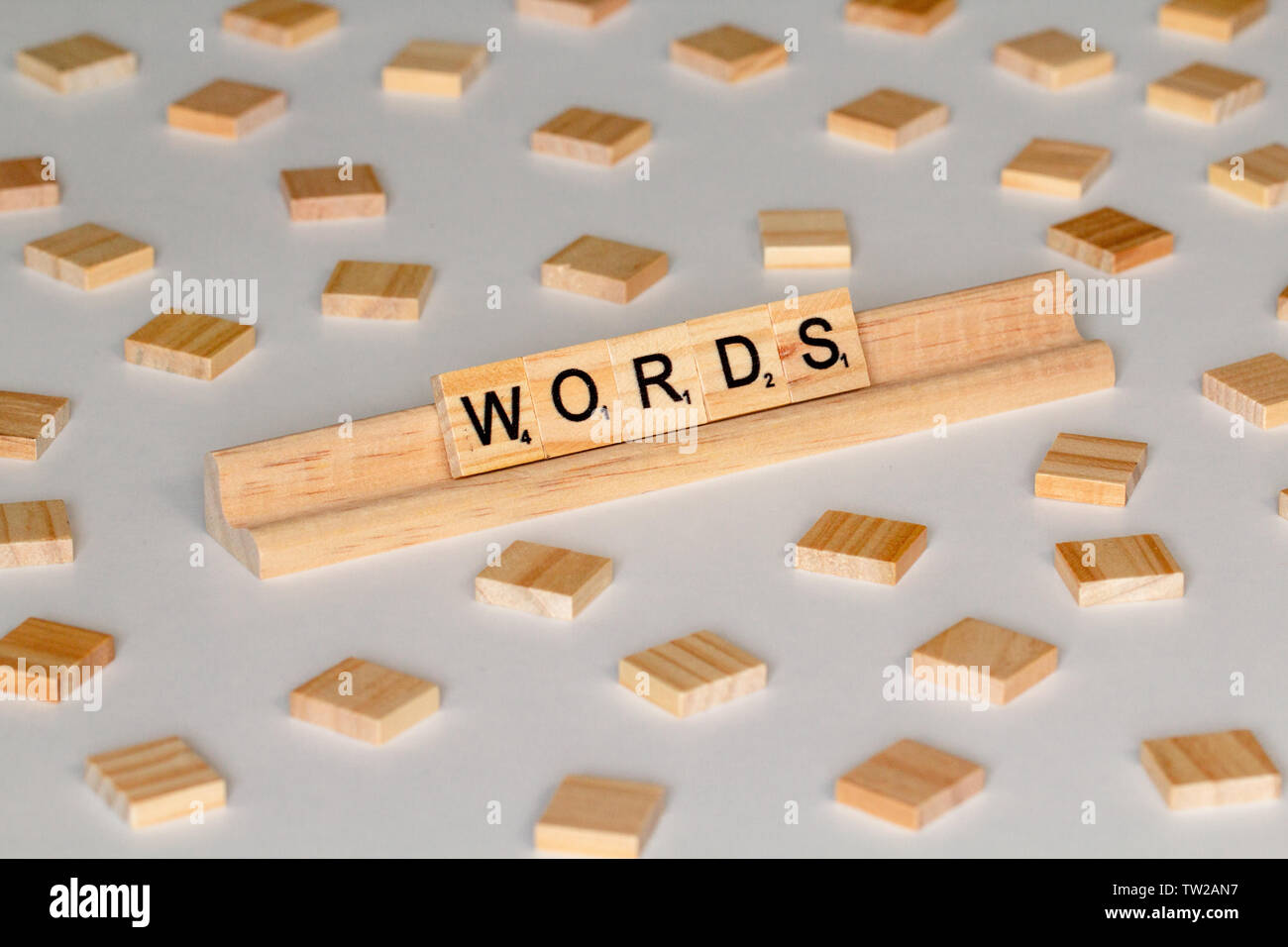 Scrabble Word Game wood tiles spelling "Words Stock Photo - Alamy