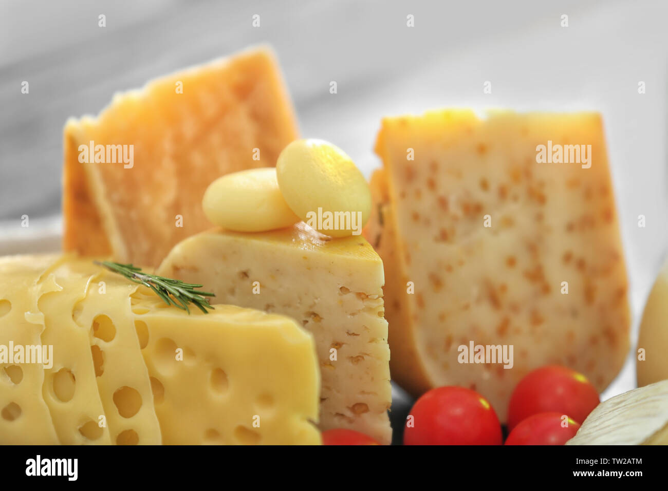 Different types of cheese on table, closeup Stock Photo - Alamy