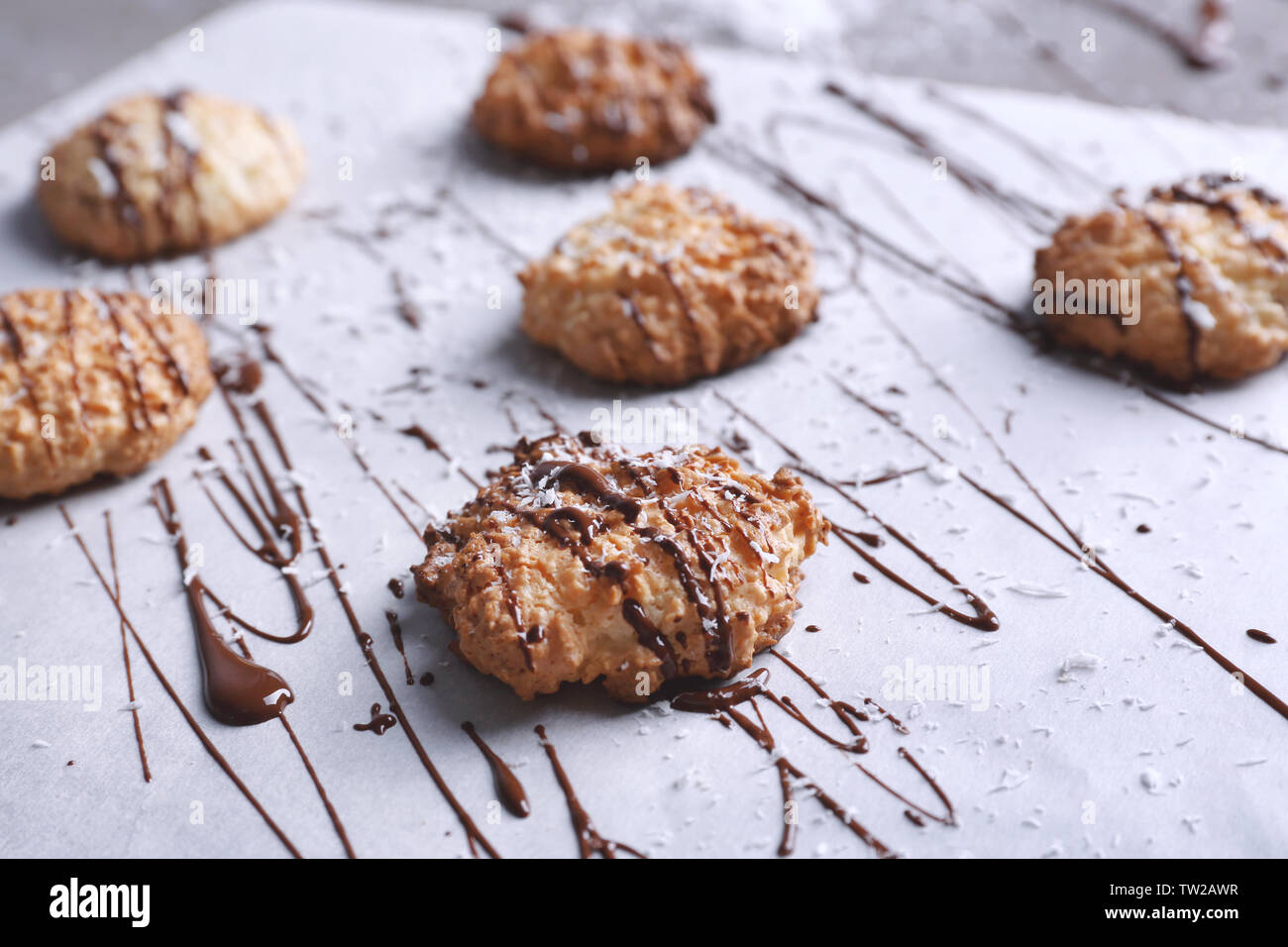 Delicious coconut macaroons on parchment paper Stock Photo - Alamy