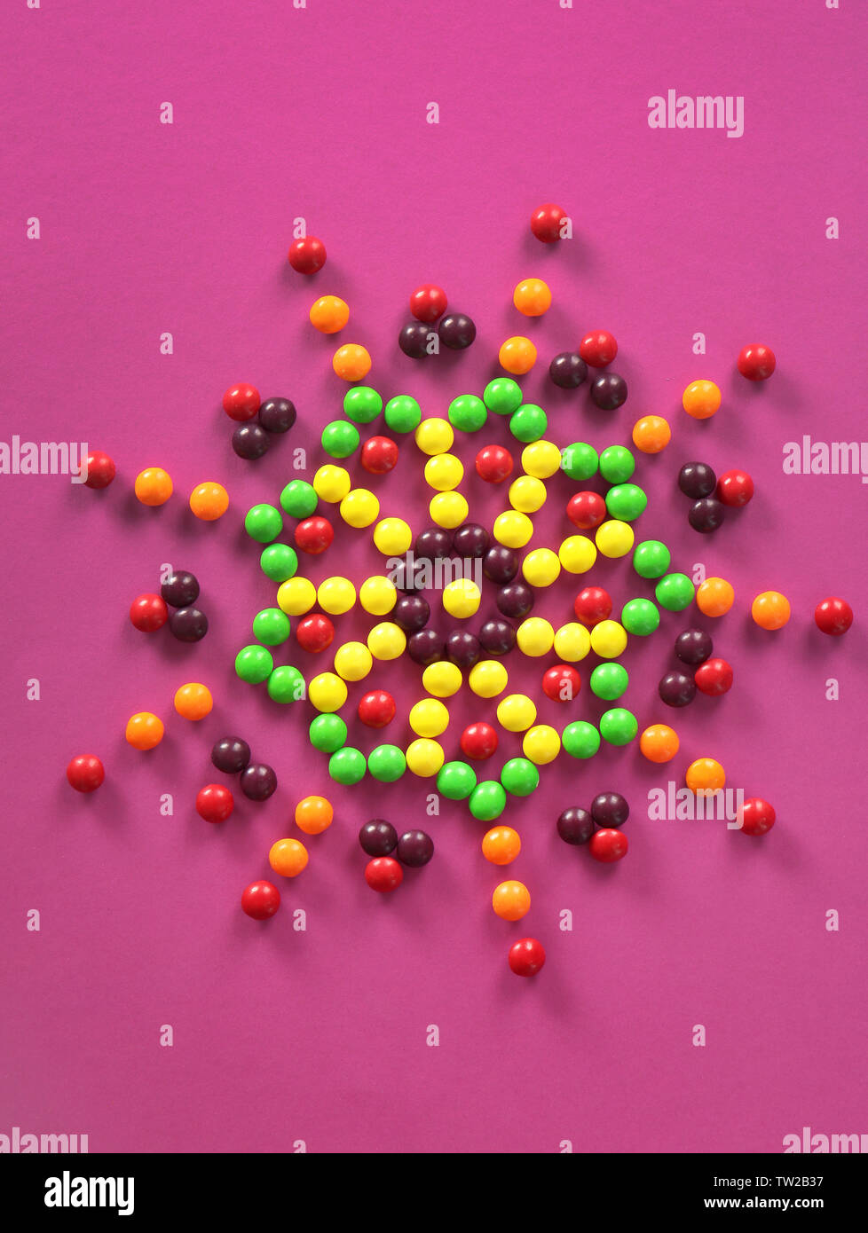 Scattered chocolate candies shape hi-res stock photography and images ...