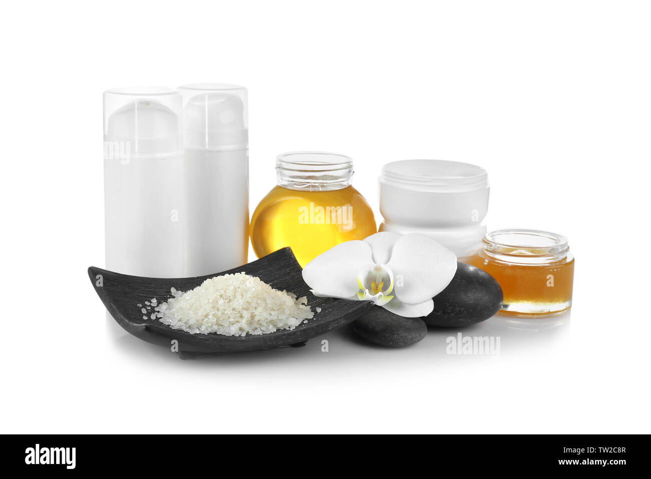Spa setting with honey and nutrient cosmetic on white background Stock ...