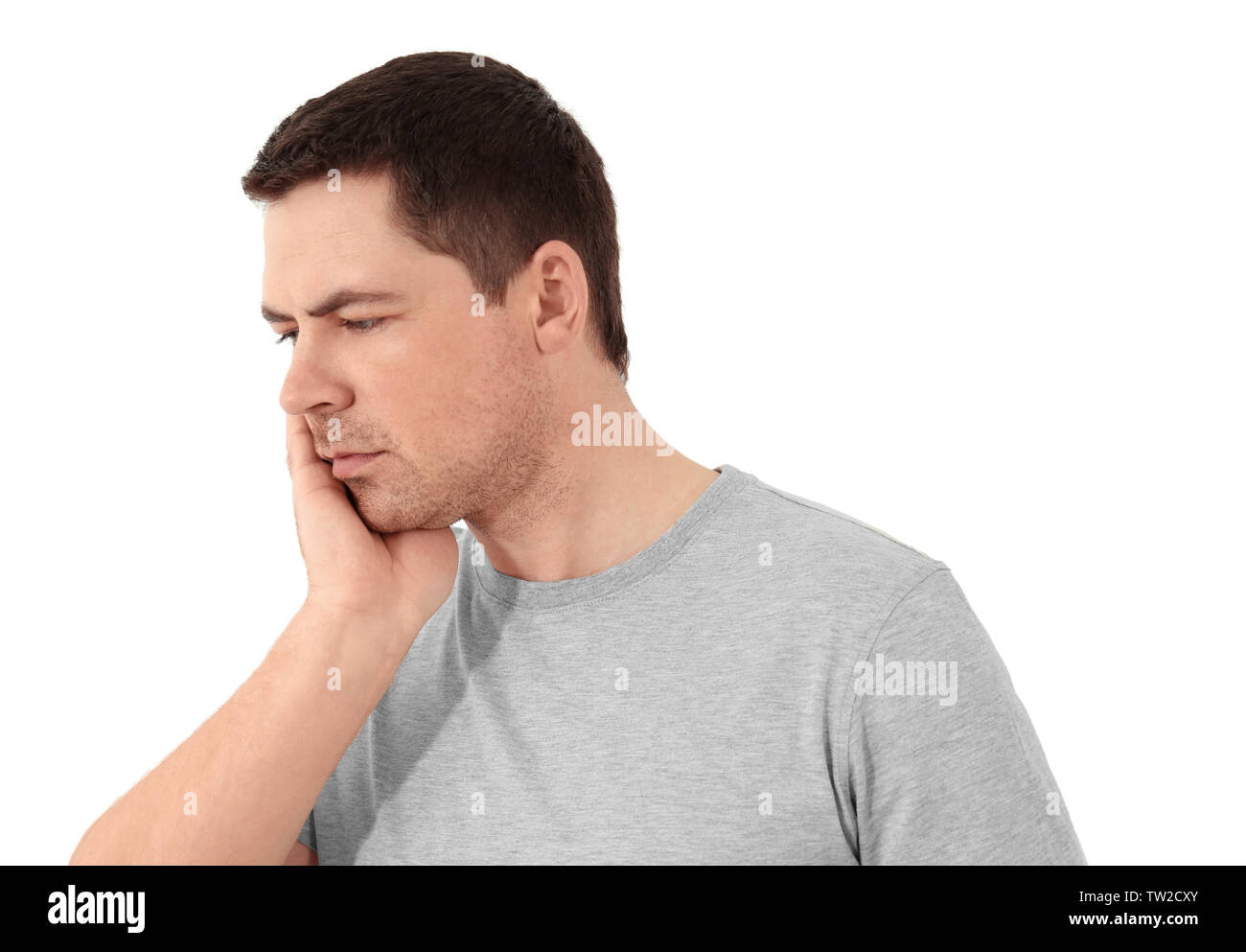 Man suffering from toothache on white background Stock Photo - Alamy