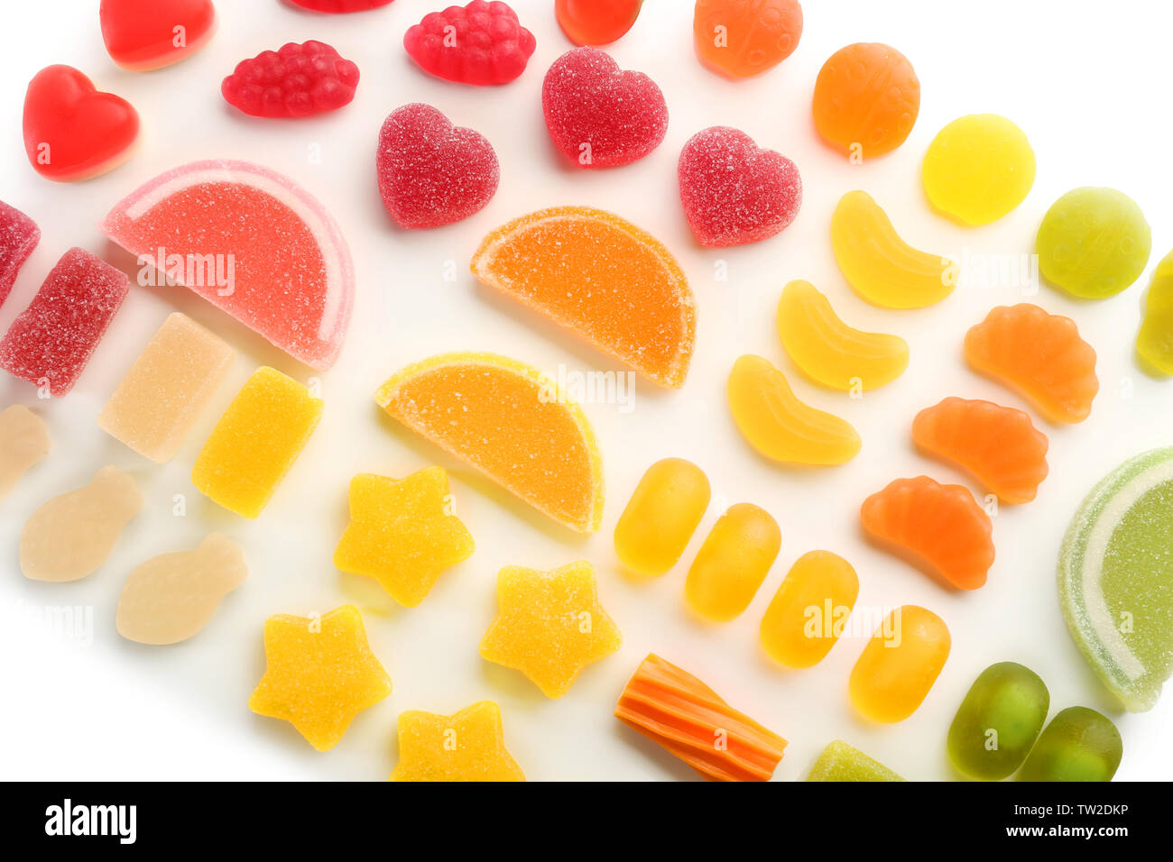 Composition of colorful jelly candies on white background Stock Photo ...