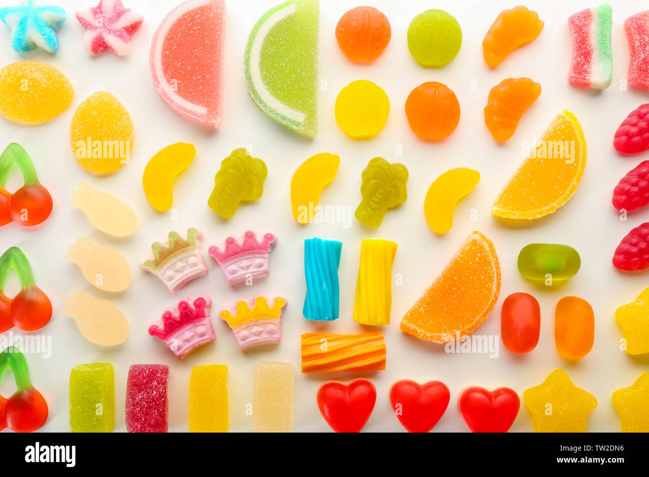 Composition of colorful jelly candies on white background Stock Photo ...