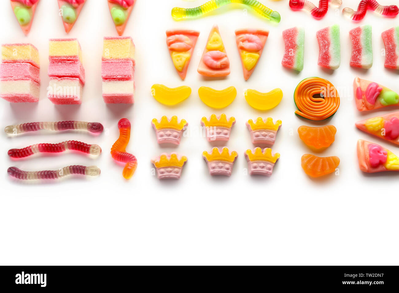 Composition of colorful jelly candies on white background Stock Photo ...