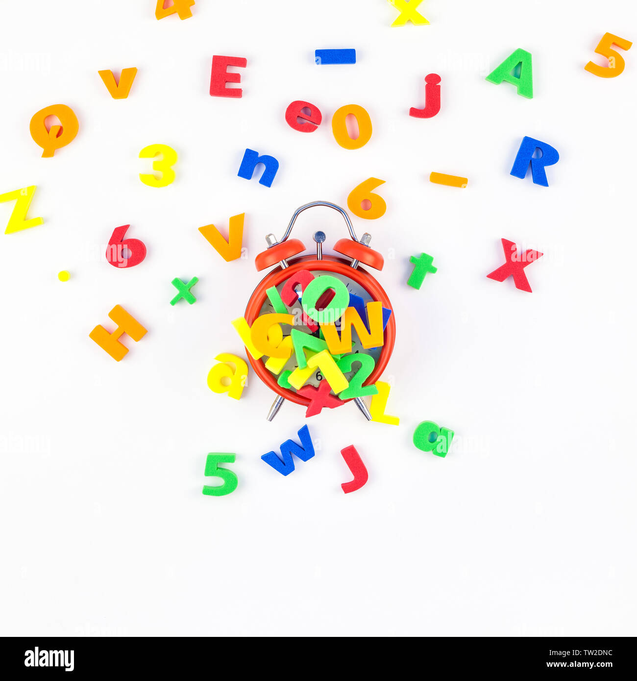 Creative flat lay back to school education concept with alarm clock and ...