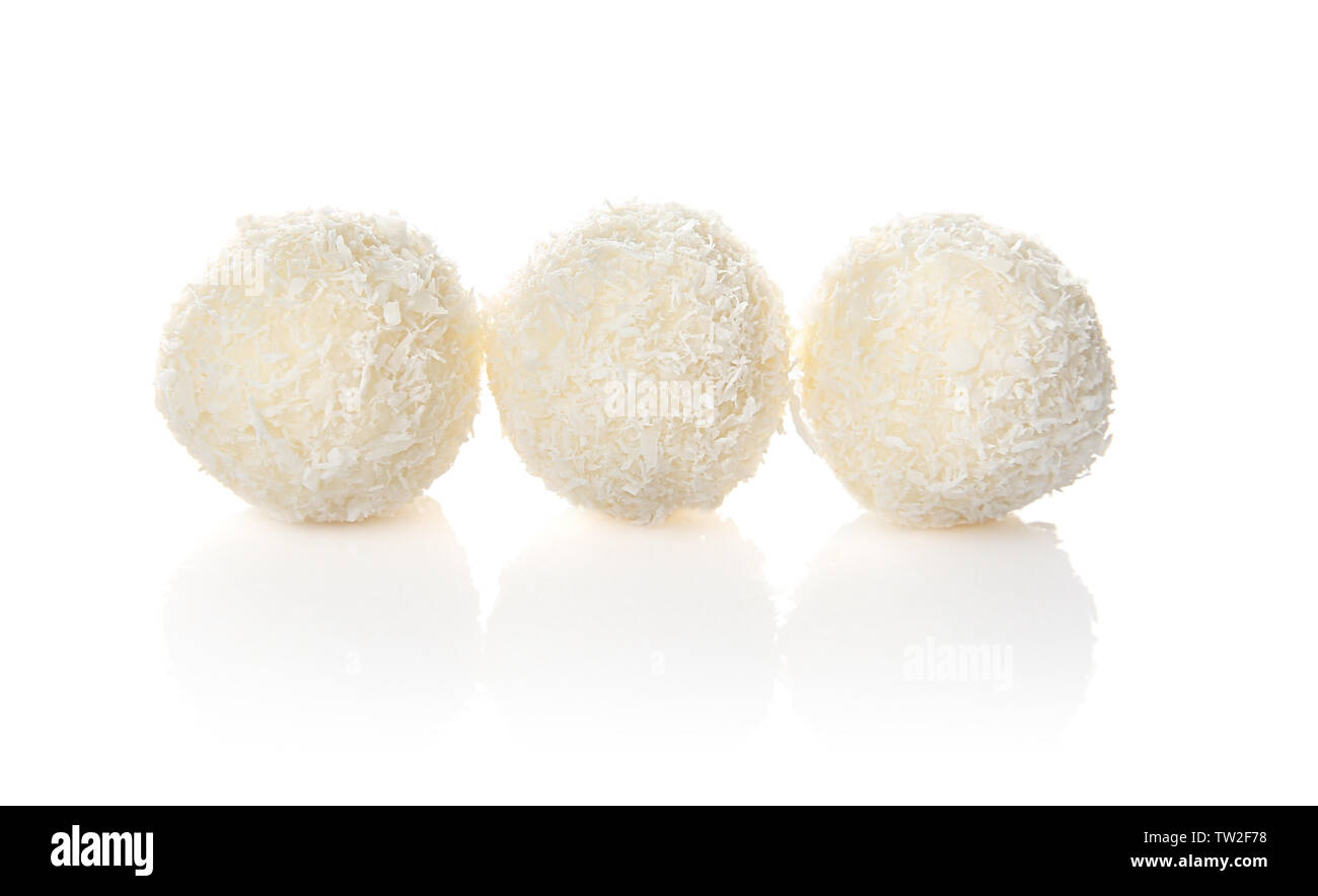 Coconut candies on white background Stock Photo - Alamy