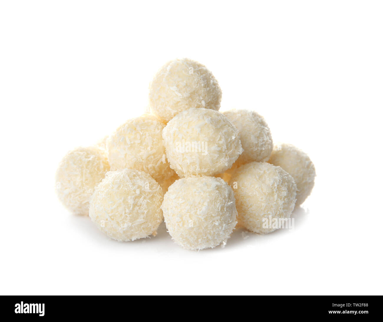Coconut candies on white background Stock Photo - Alamy