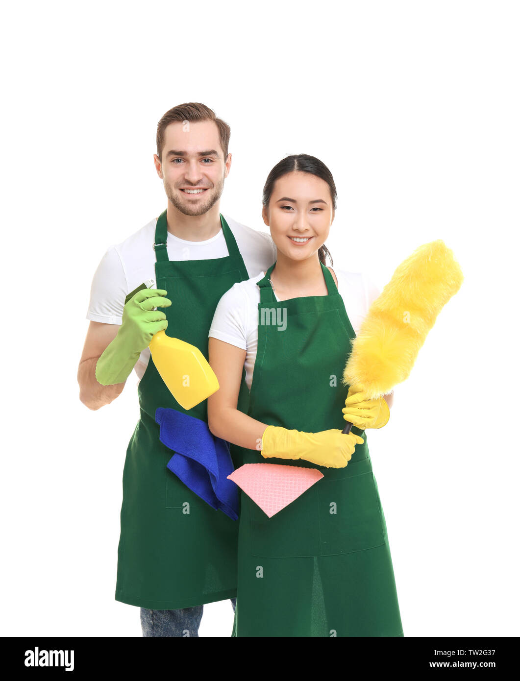 Cleaning service team in green aprons on white background Stock Photo ...