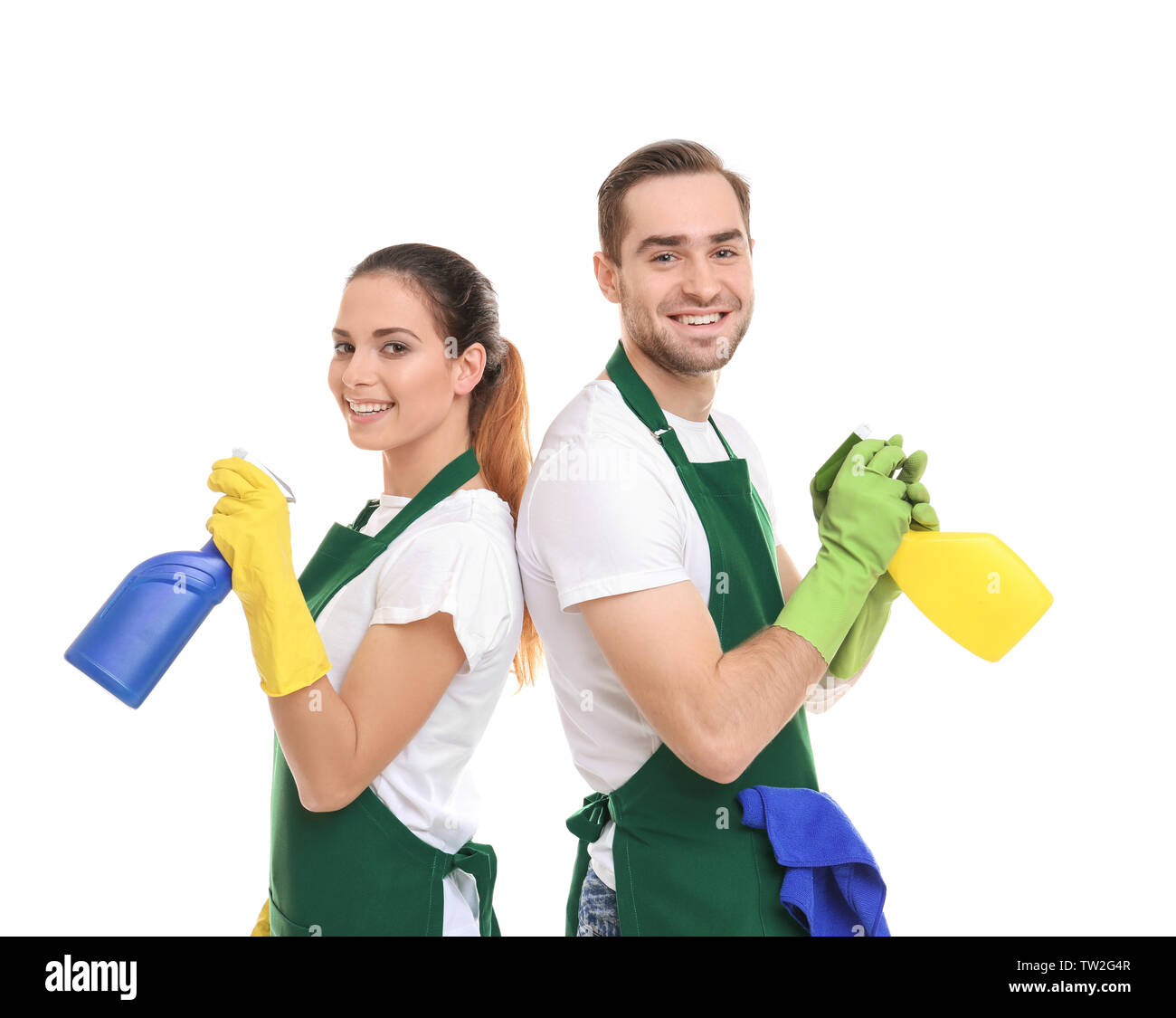 Cleaning service team in green aprons on white background Stock Photo ...