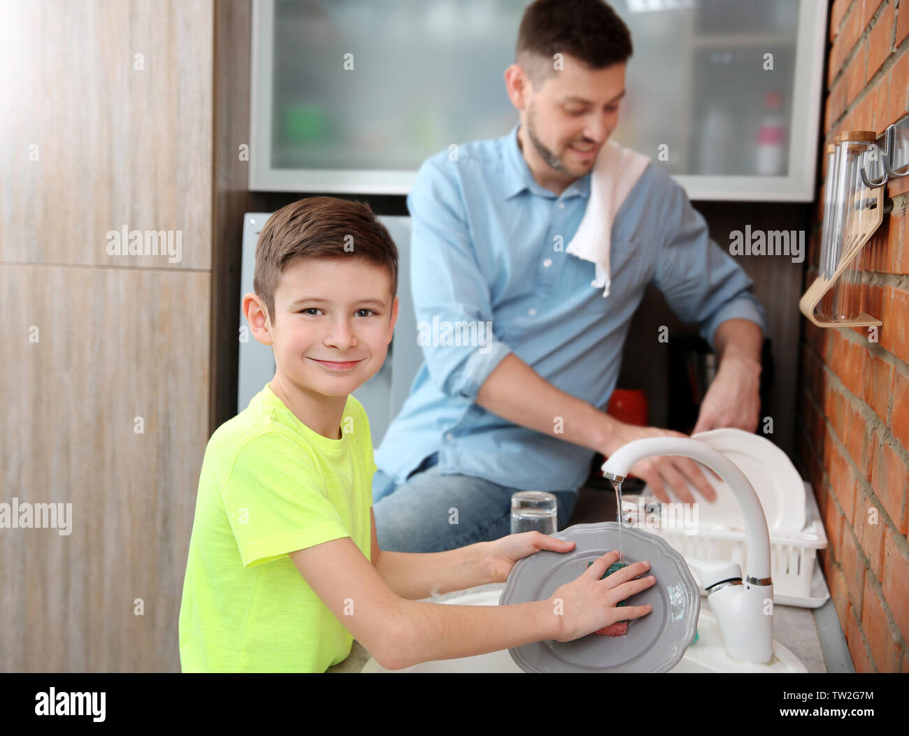 Dad with kid in towel hi-res stock photography and images - Alamy