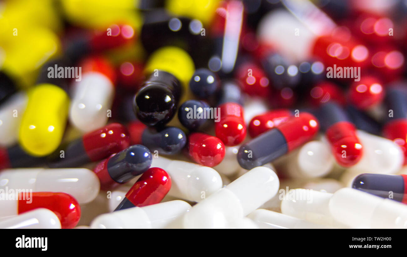 Close up of many different pills and tablets medicine isolated on white ...