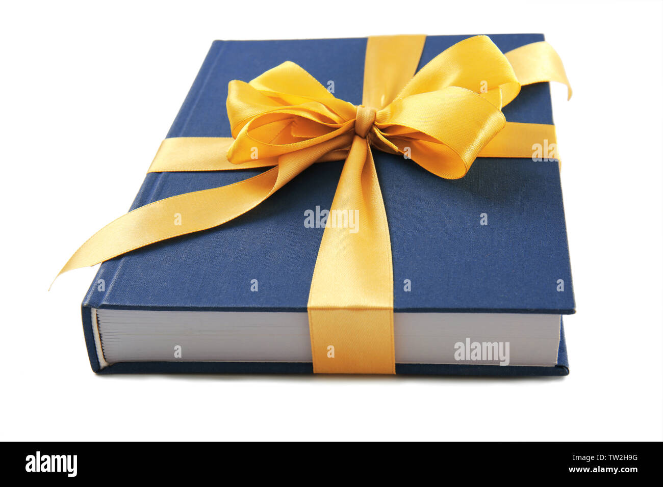Book with ribbon as gift on white background Stock Photo - Alamy