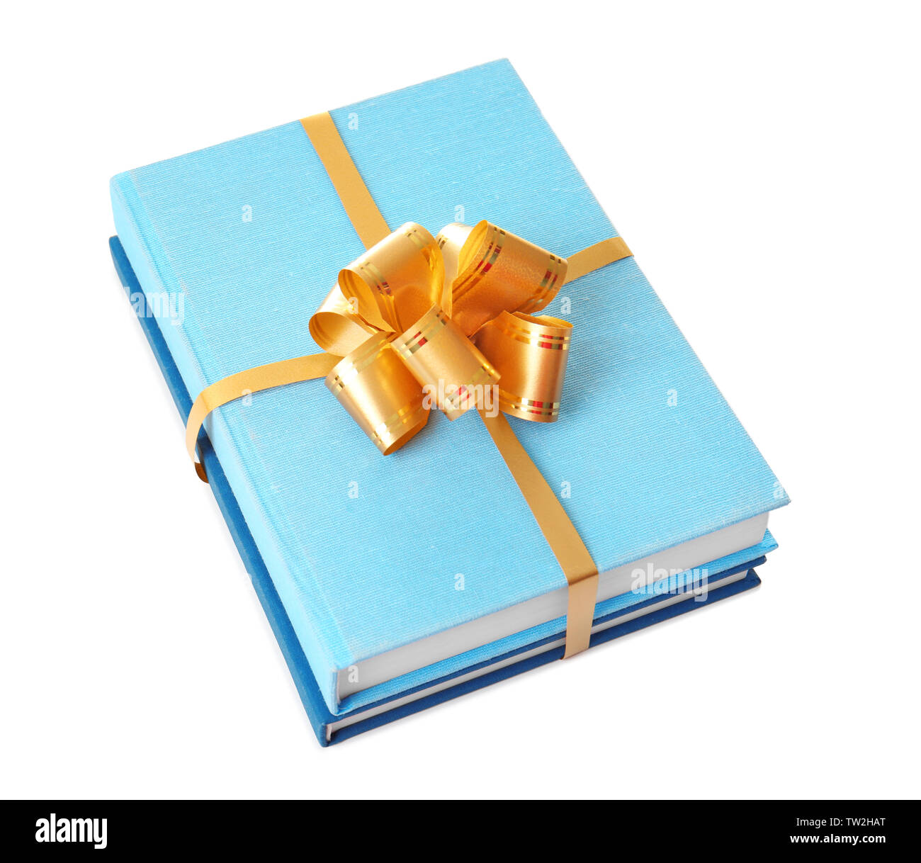 Two books with ribbon as gift on white background Stock Photo - Alamy