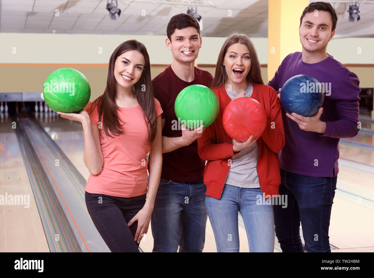 Happy group people bowling having hi-res stock photography and images ...