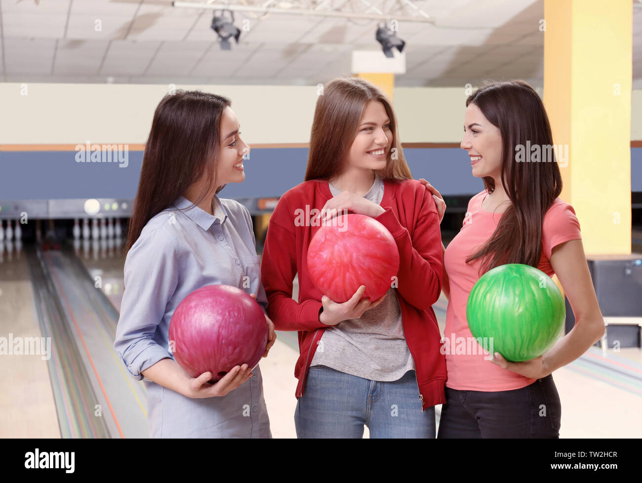 Happy group people bowling having hi-res stock photography and images ...