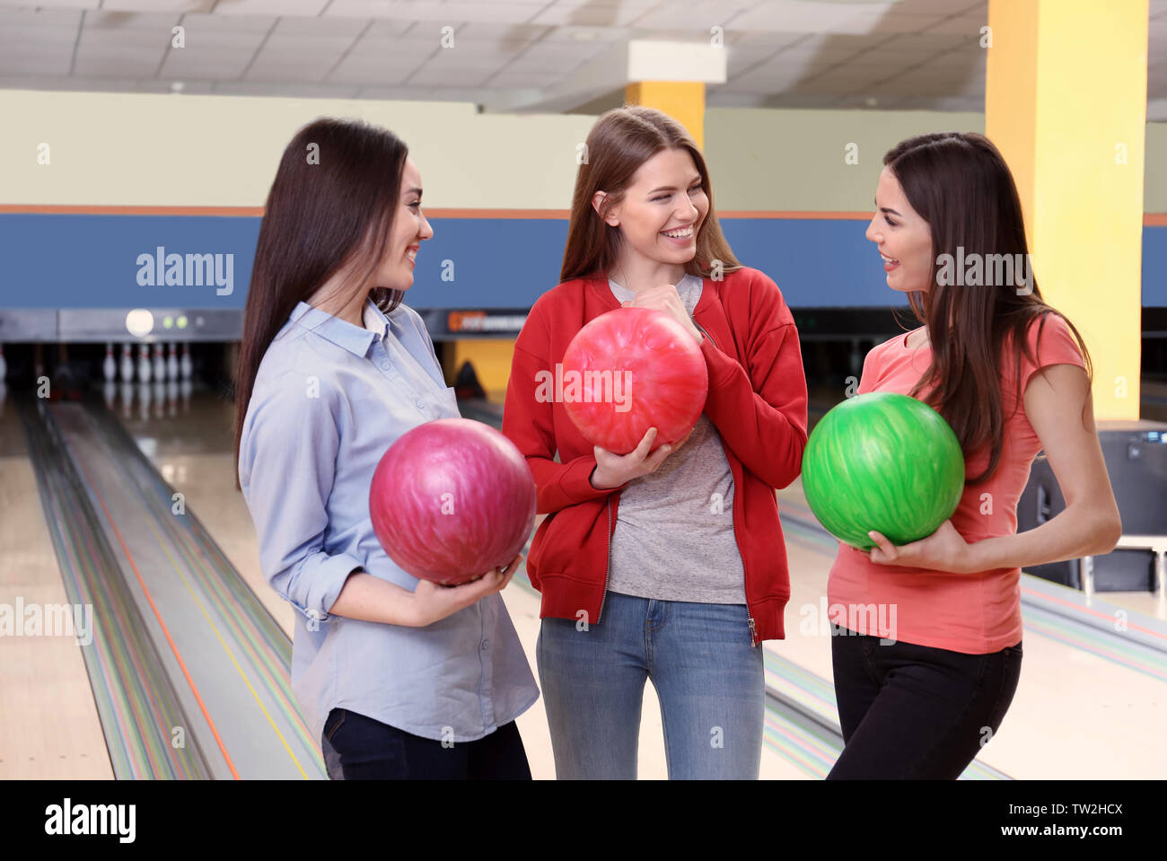 Happy group people bowling having hi-res stock photography and images ...