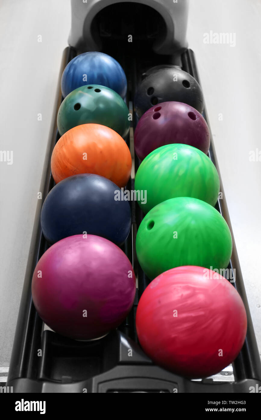 Bowling balls in rack hi-res stock photography and images - Alamy