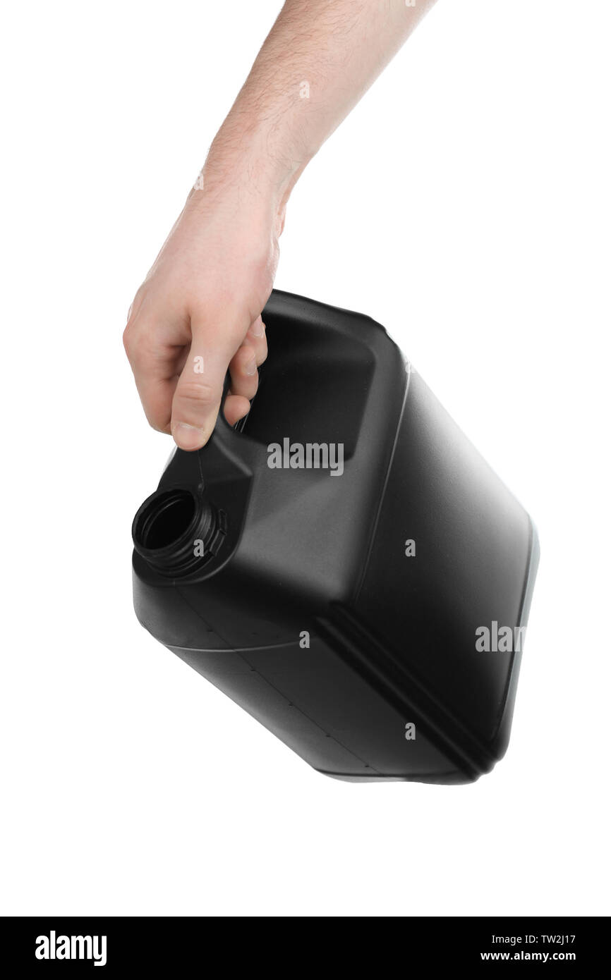 Human hand pouring out oil from black plastic jerrycan on white ...