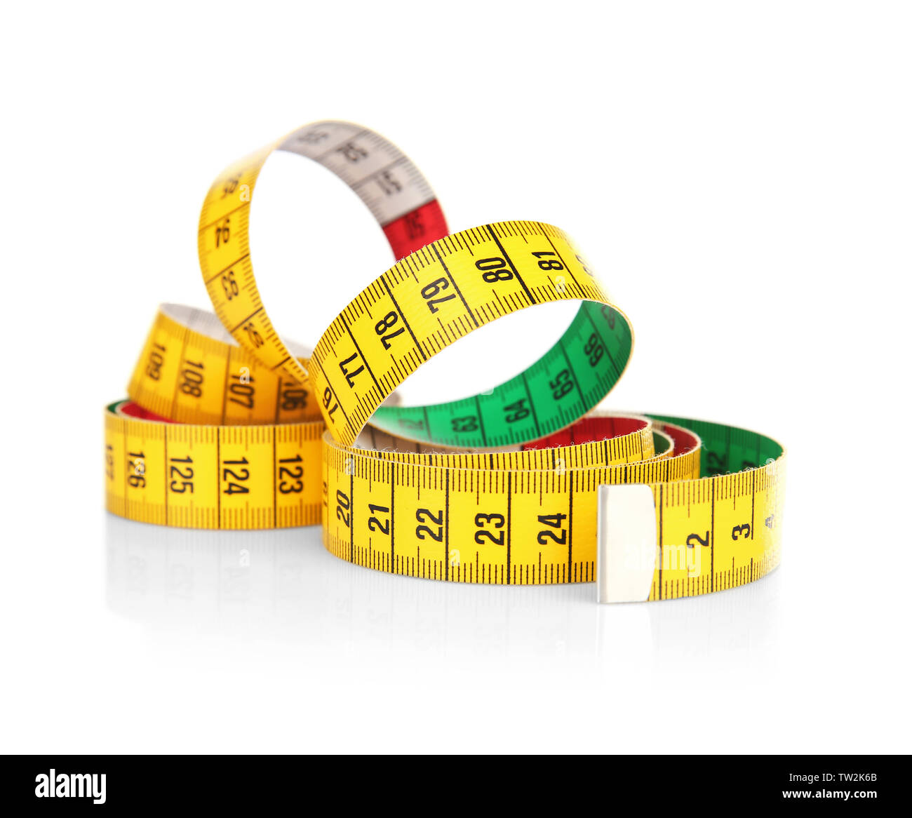 Diet concept. Color measuring tape on white background Stock Photo - Alamy