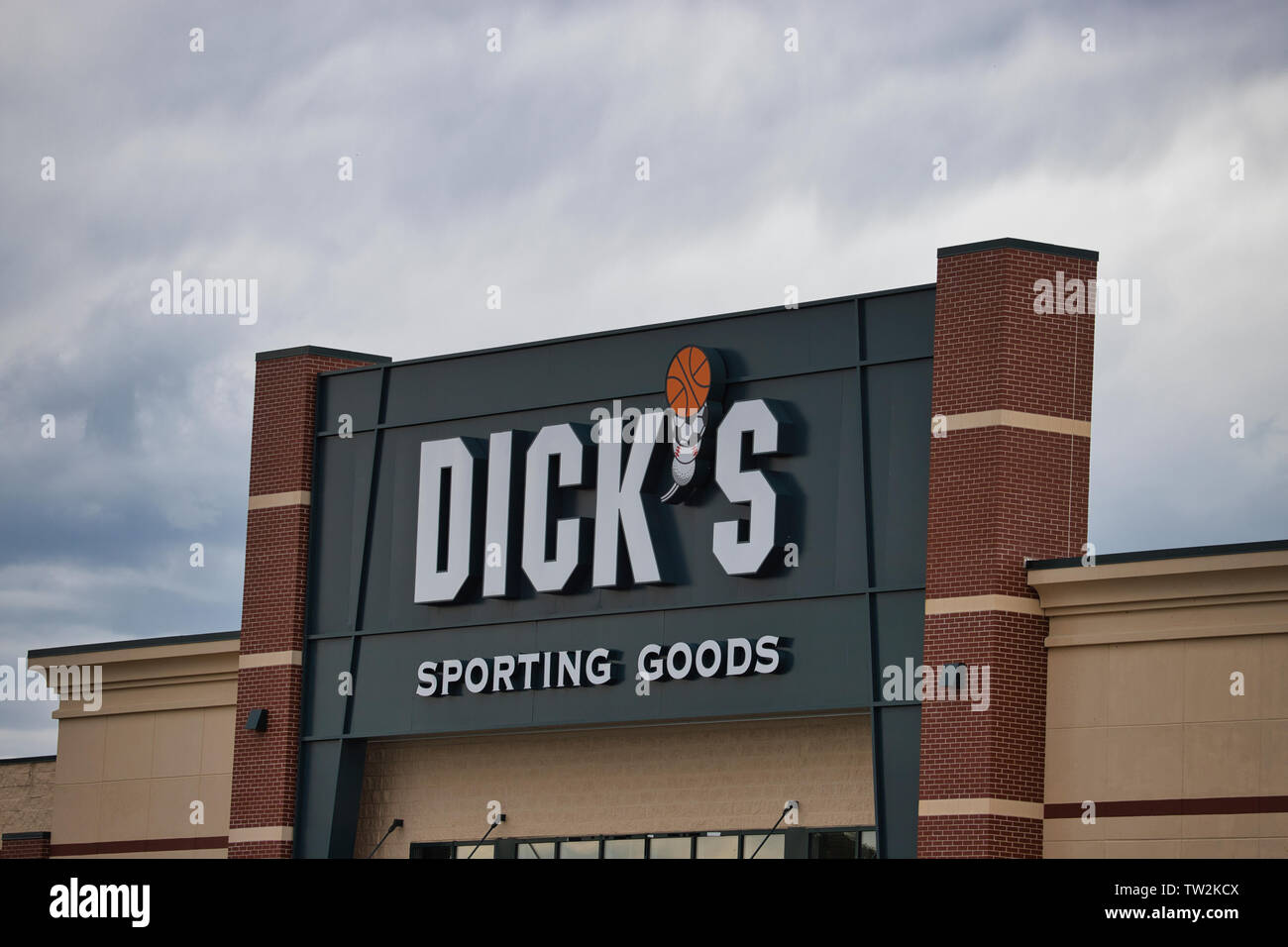 Storefront sign with some sky and clouds. June 2019. Southern Indiana ...
