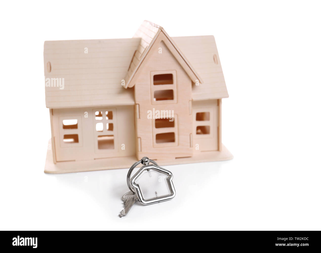 House model and key on white background Stock Photo - Alamy