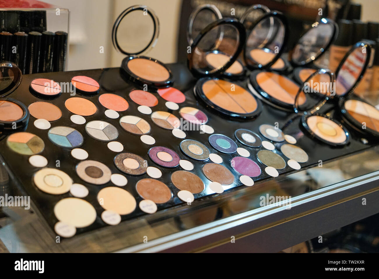 Different cosmetics in modern shop Stock Photo - Alamy
